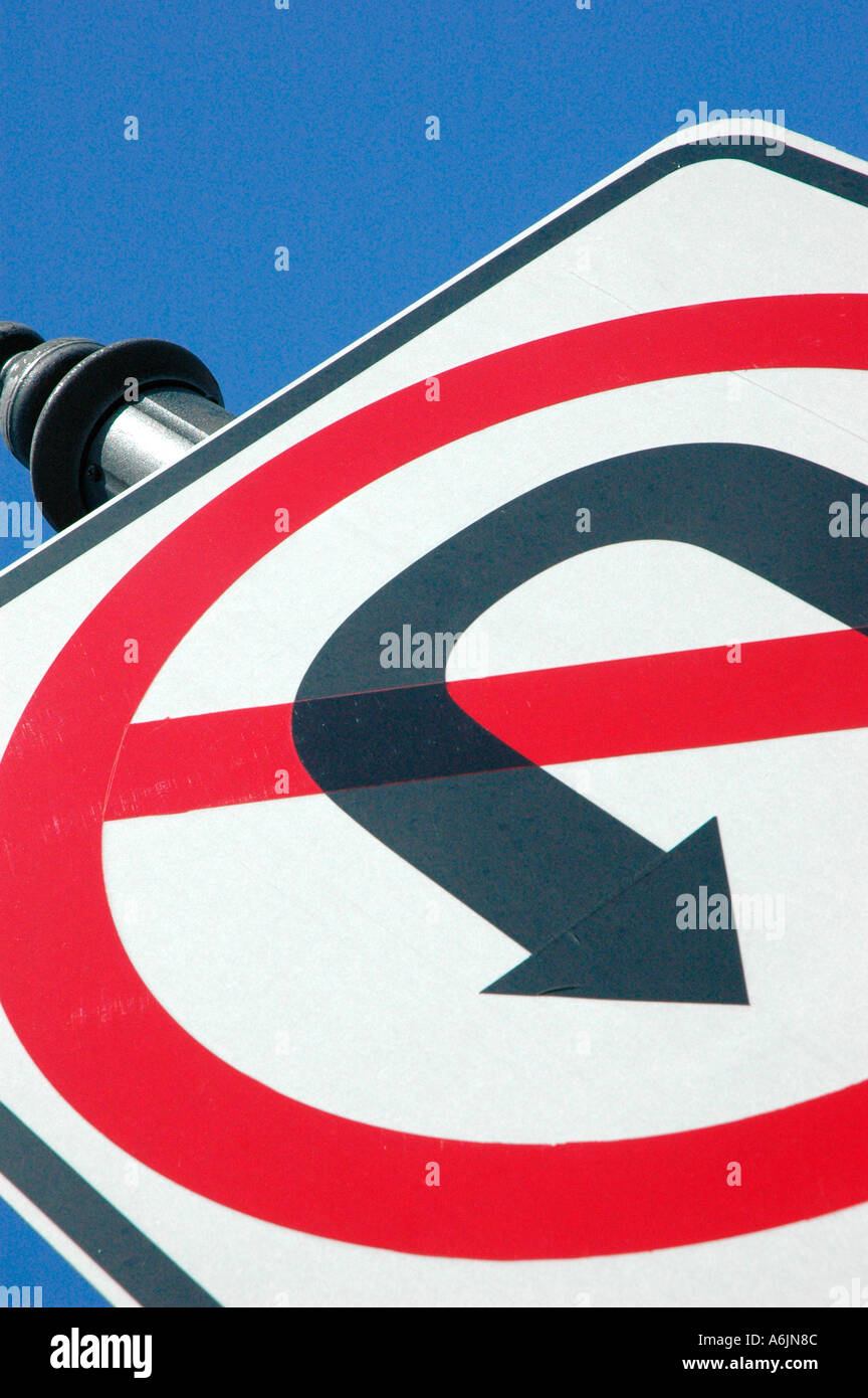 No U turn permitted at this corner sign on road around Stock Photo - Alamy