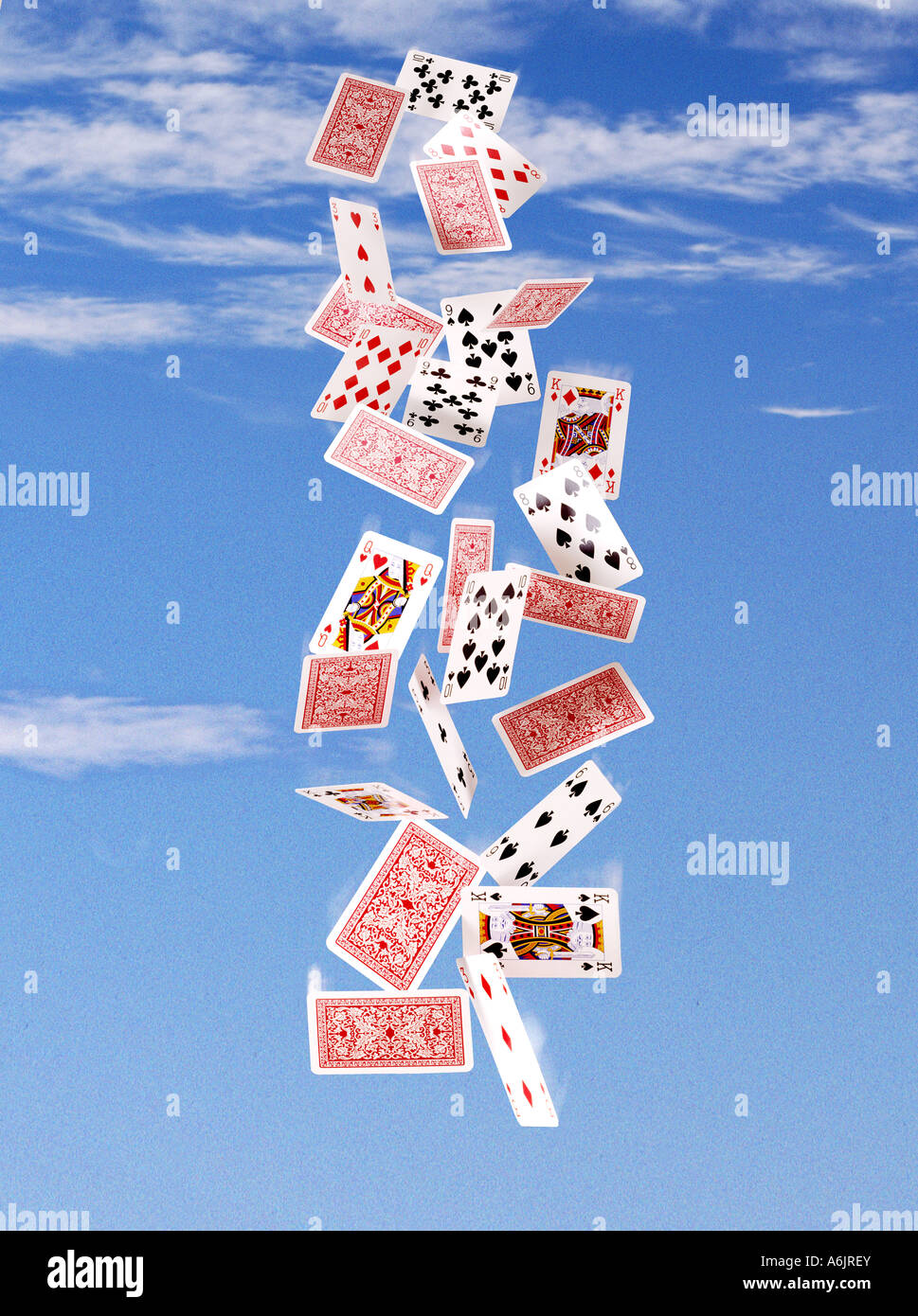playing cards falling from the sky Stock Photo - Alamy