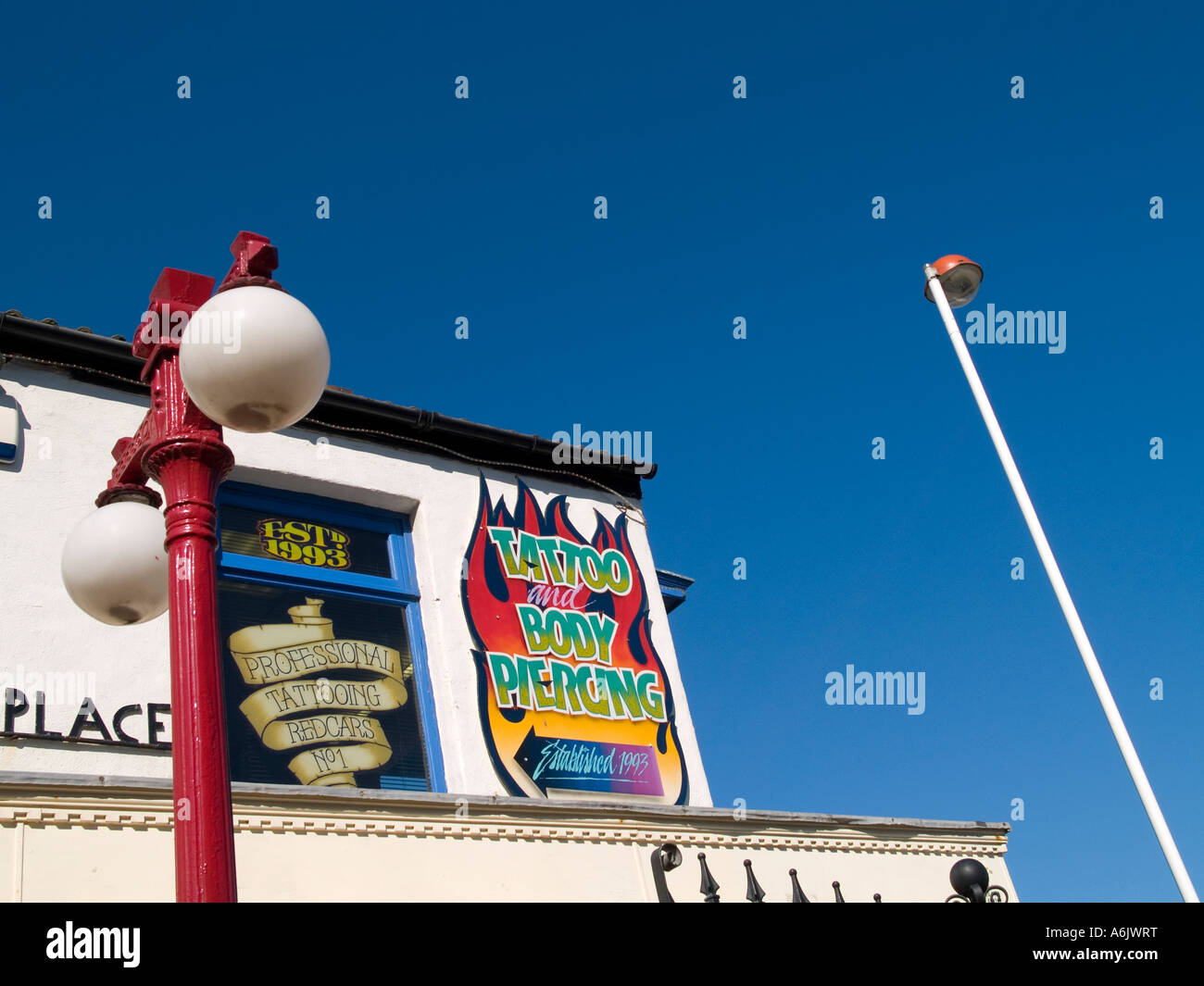 Colourfull tattoo parlour sign Redcar Cleveland UK Stock Photo - Alamy