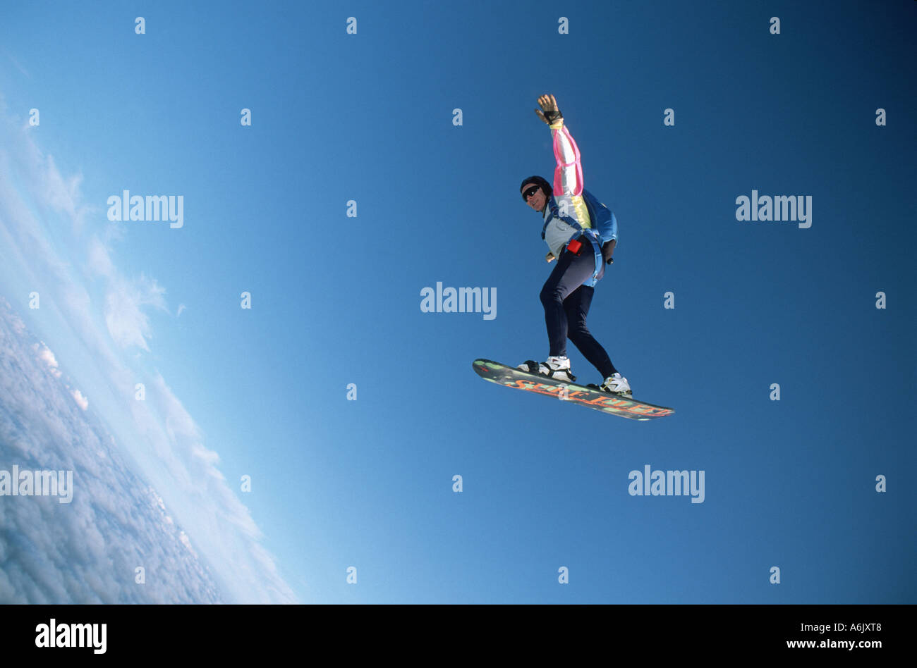 Parachuter parachuting down from sky hi-res stock photography and ...