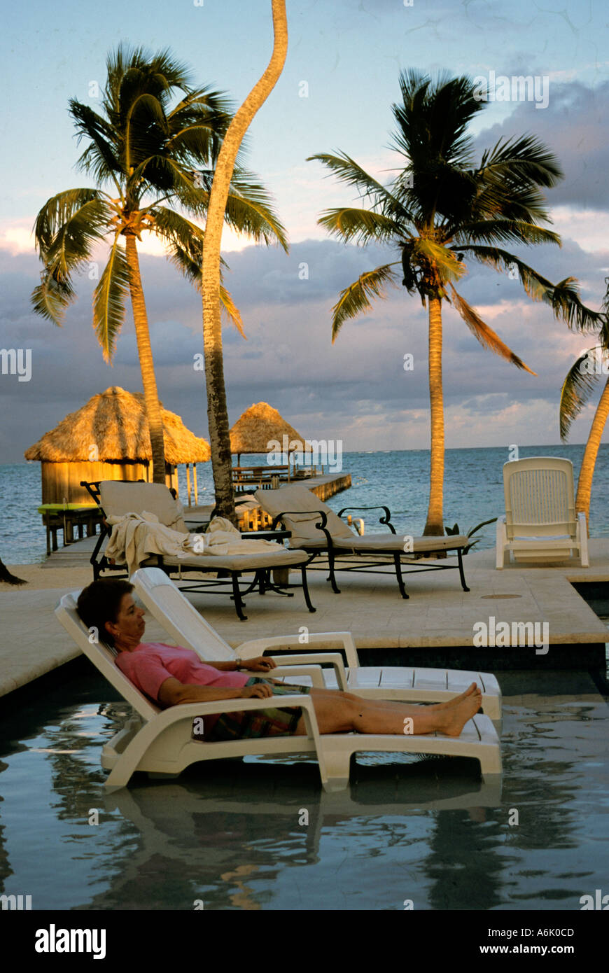 Peaceful tropical sunset scene Ambergris key in Belize Stock Photo - Alamy