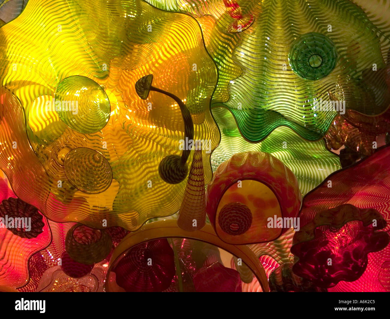 Colorful transparent glass plates arranged with a backlight very ...