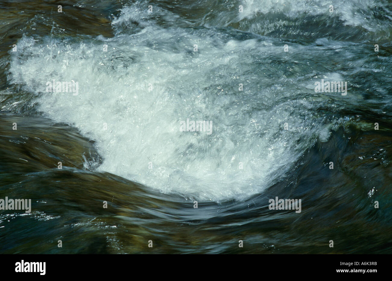 section of a river with a swift current Stock Photo - Alamy