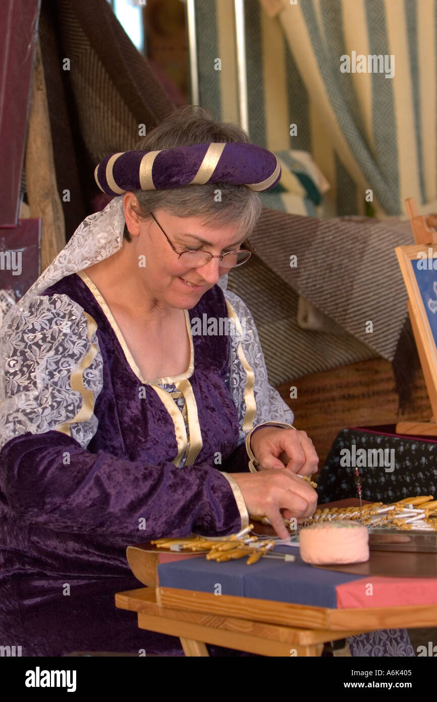 French medieval lacemaker, woman in period costume, wearing glasses at ...