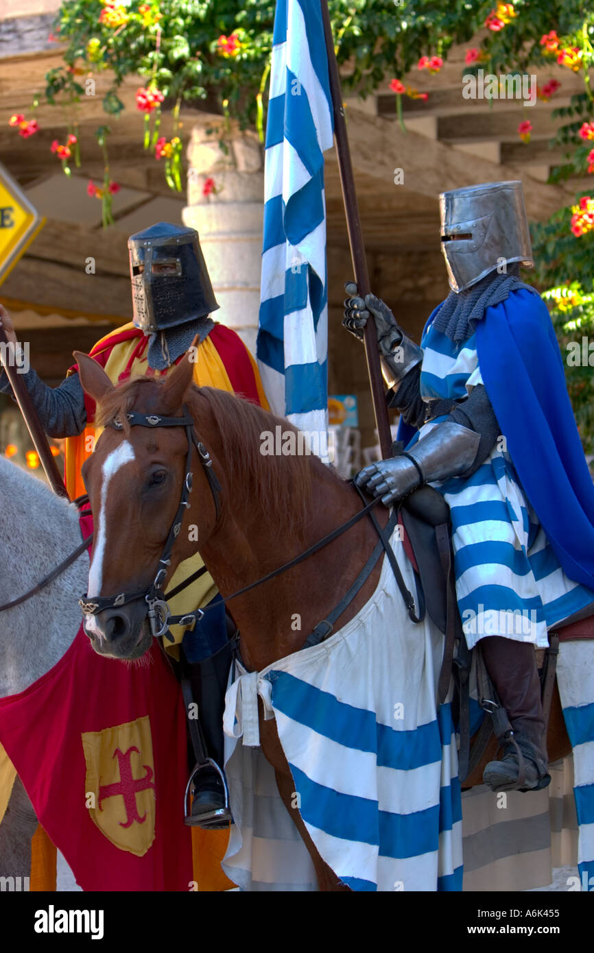 Two French medieval knights on horseback, one with blue and white ...