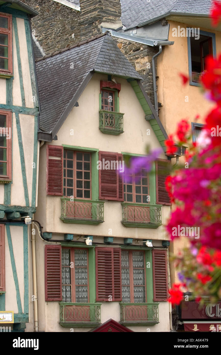 Medieval shop fronts with wooden shutters and out of focus foreground ...