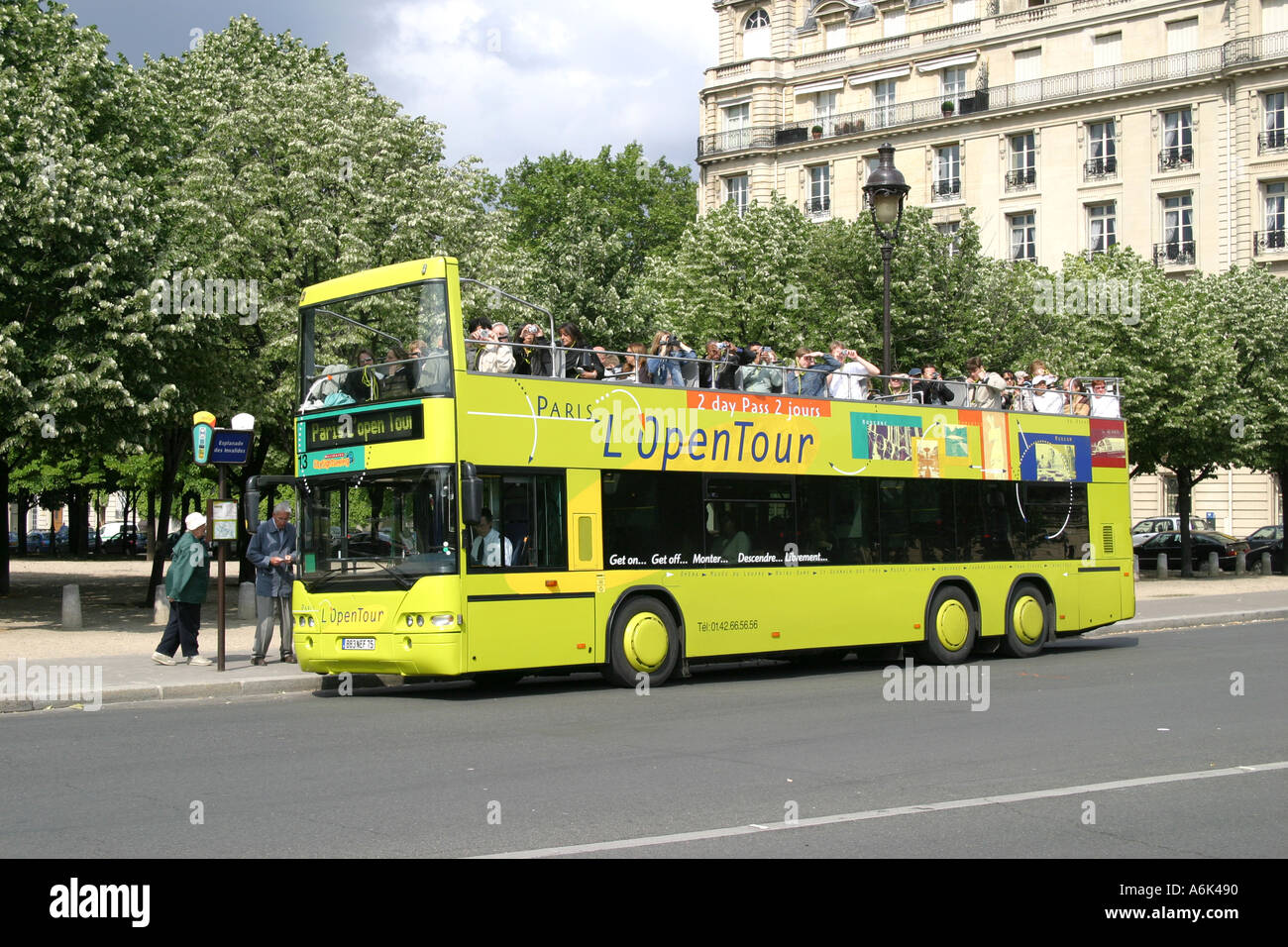 Open top sightseeing bus in Paris Stock Photo - Alamy