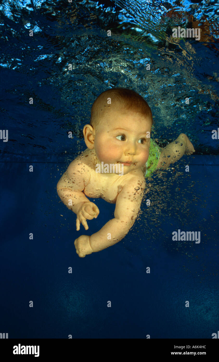 baby diving in pool Stock Photo - Alamy