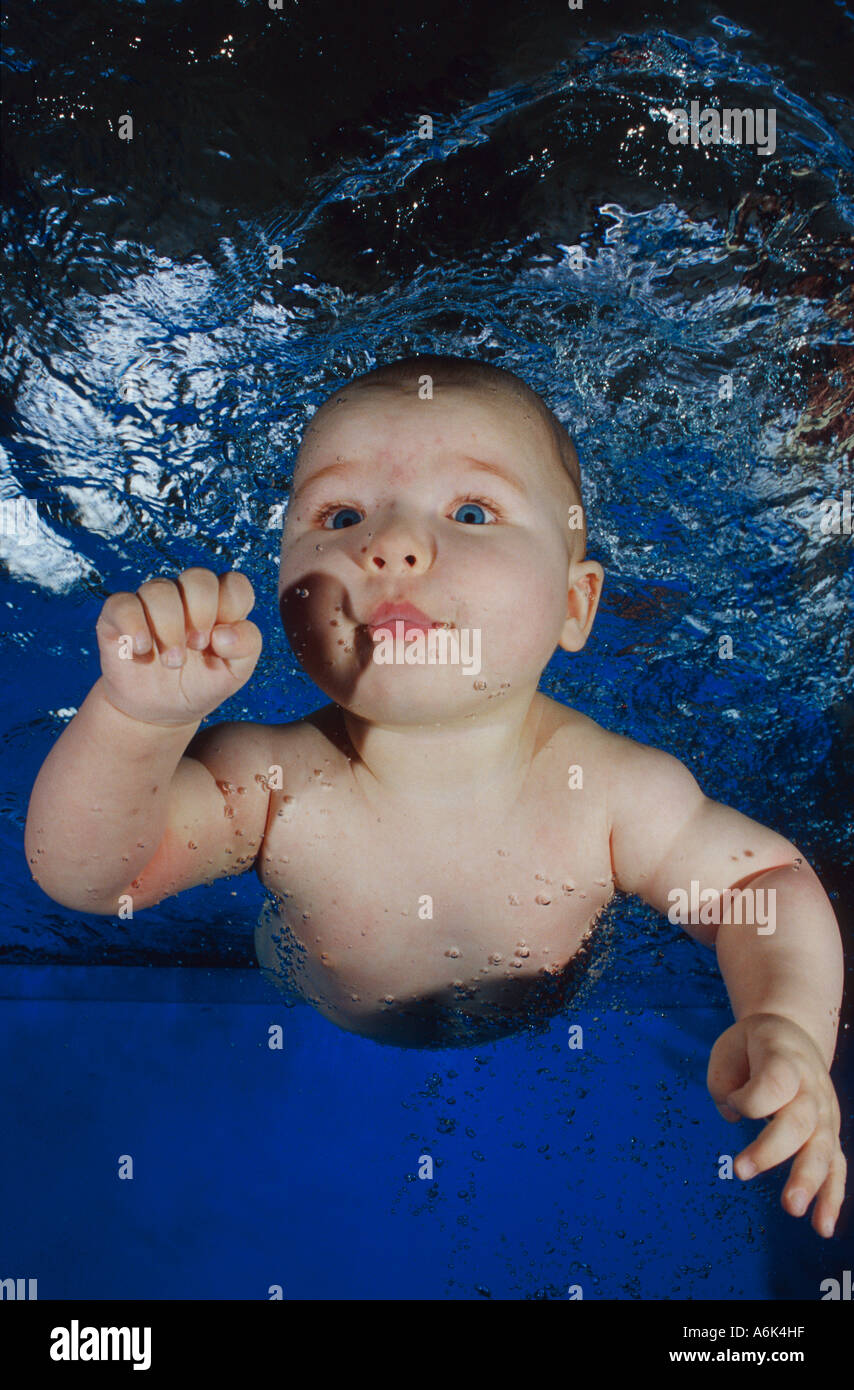 baby diving in pool Stock Photo - Alamy