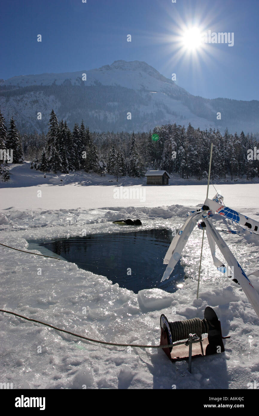 hole for ice diving on a frozen lake Stock Photo - Alamy