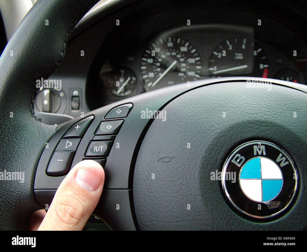 In car finger control for mobile phone on steering wheel Stock Photo ...