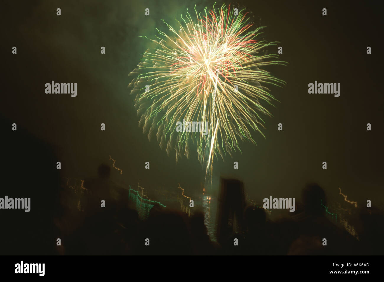 Spectators watch 4th of July fireworks Stock Photo - Alamy
