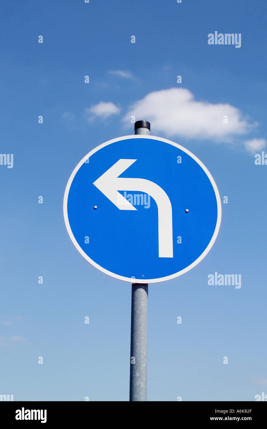 traffic sign with arrow to the left Stock Photo - Alamy