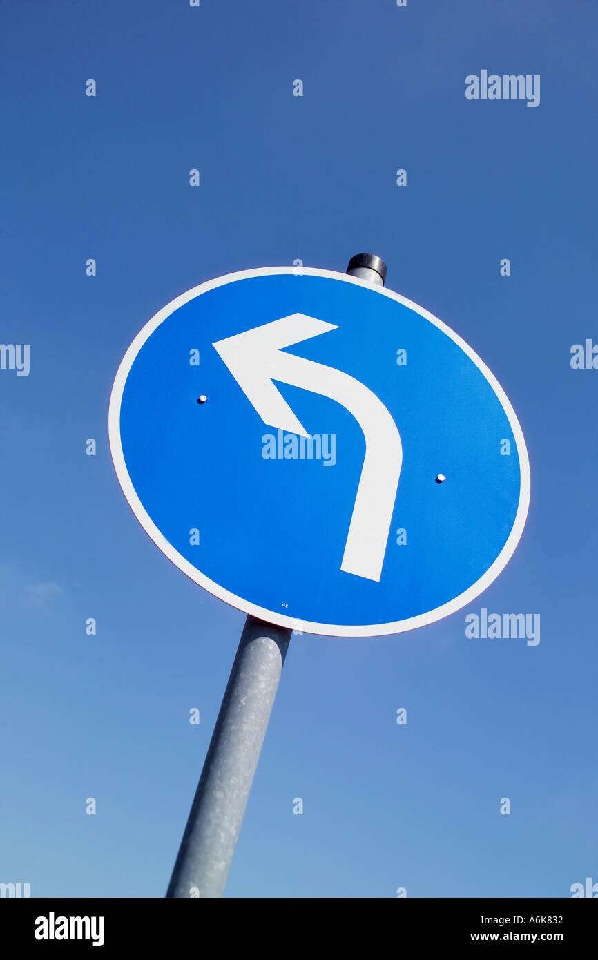 traffic sign with arrow to the left Stock Photo - Alamy