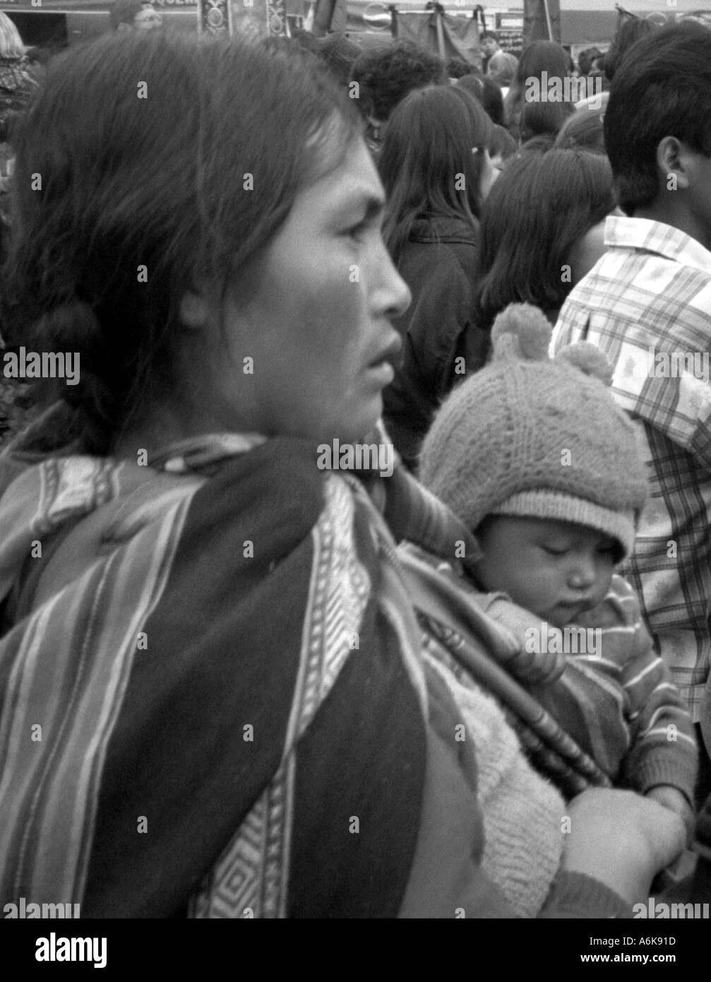 Portrait group indigenous women gather carry baby hug shoulder outdoor ...