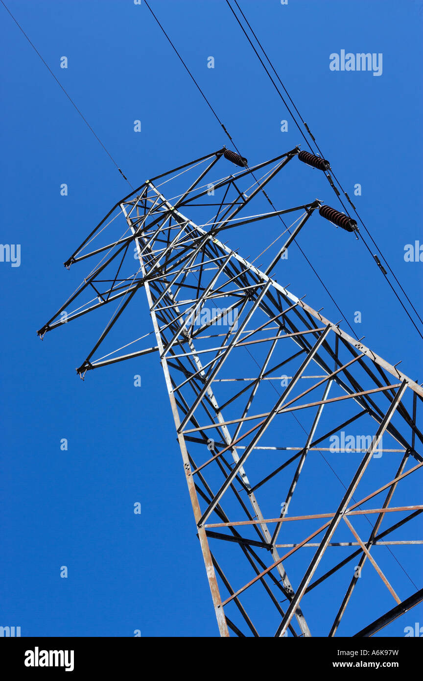 ELECTRICITY PYLON AND CABLES WITH BLUE SKY Stock Photo - Alamy
