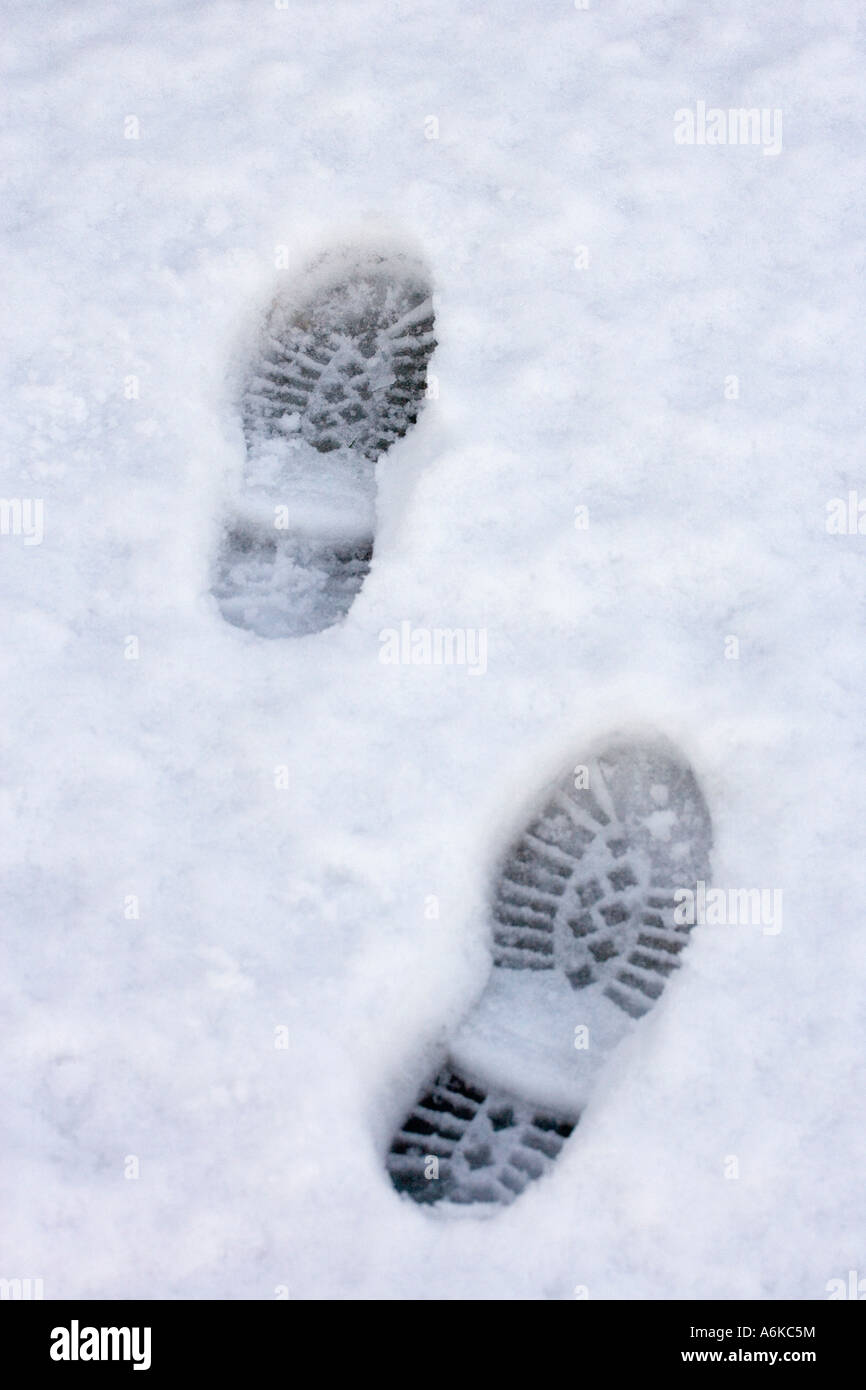 BOOTPRINTS IN SNOW Stock Photo - Alamy