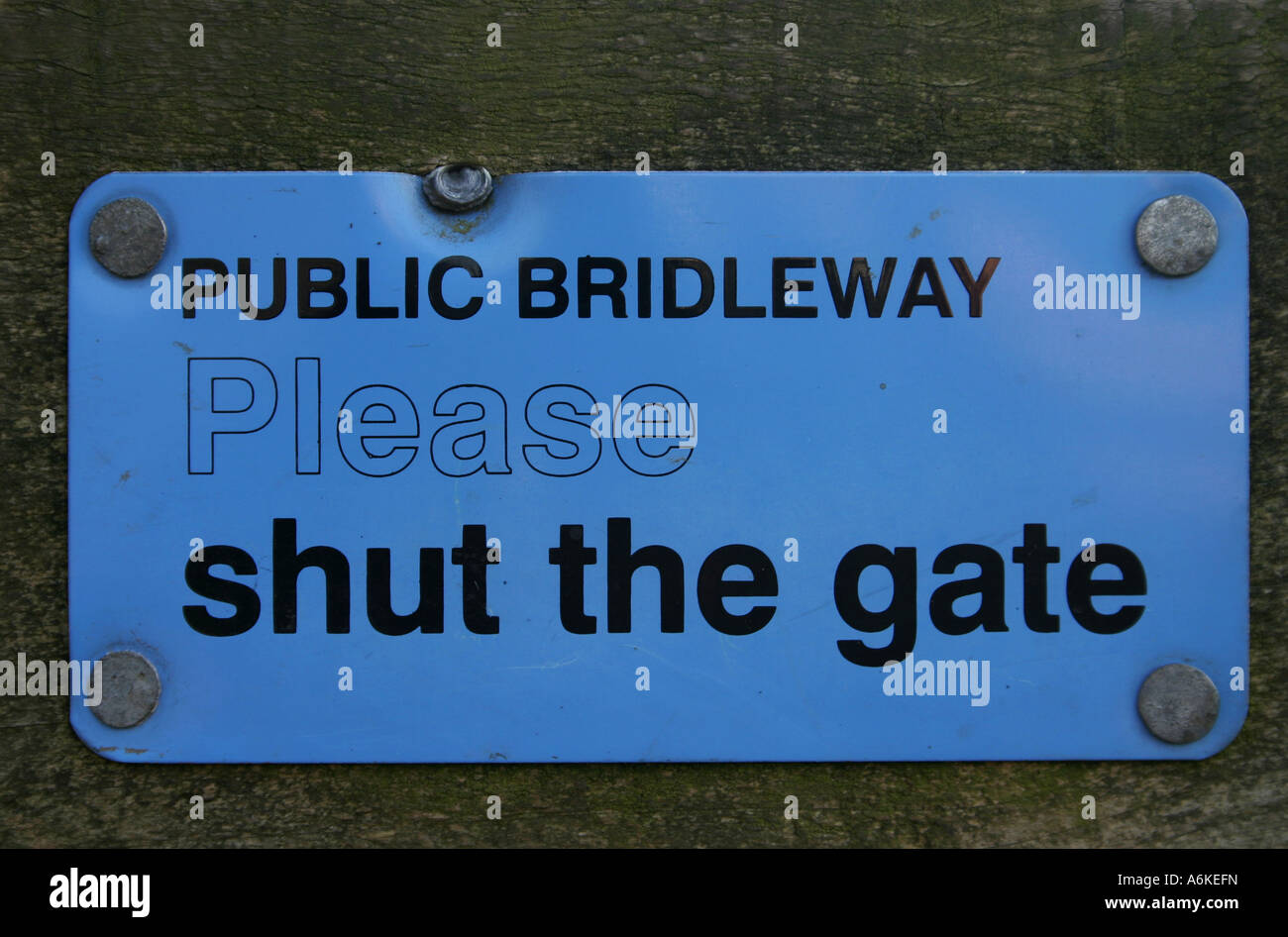 Blue Public Footpath sign Please Shut the Gate notice on a stile near ...