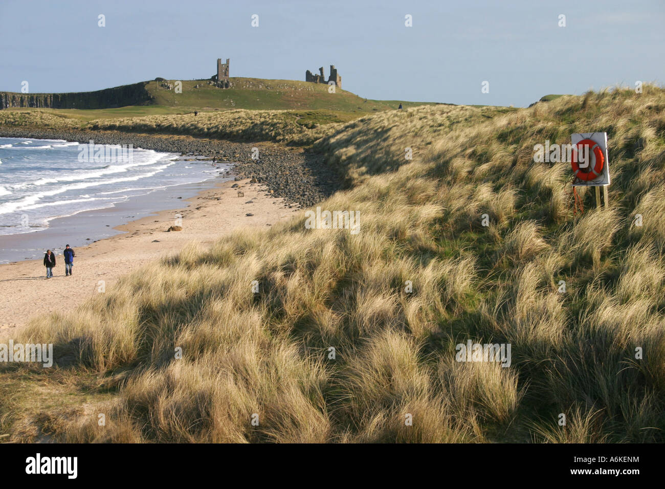 view of Dunstanburgh Castle from the beach near Embleton Northumberland ...