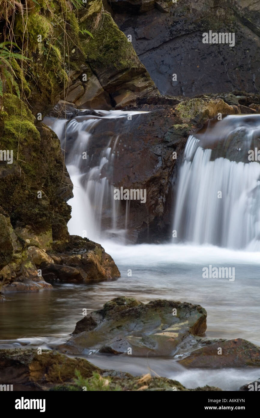 Waterfall and stream Stock Photo - Alamy