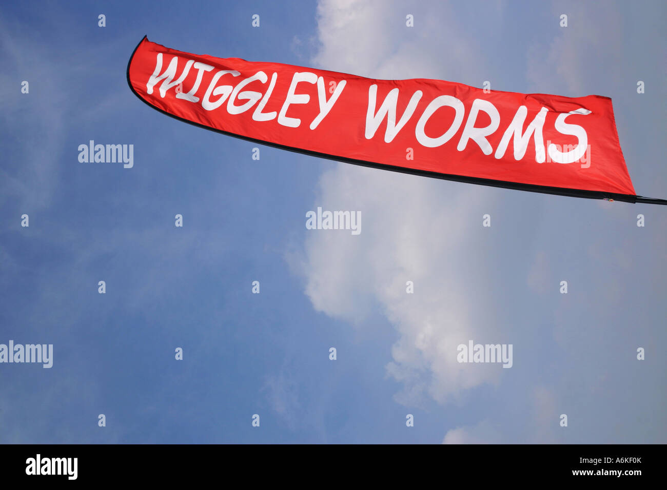 Wiggley Worms banner sign blowing in the wind United Kingdom Stock ...