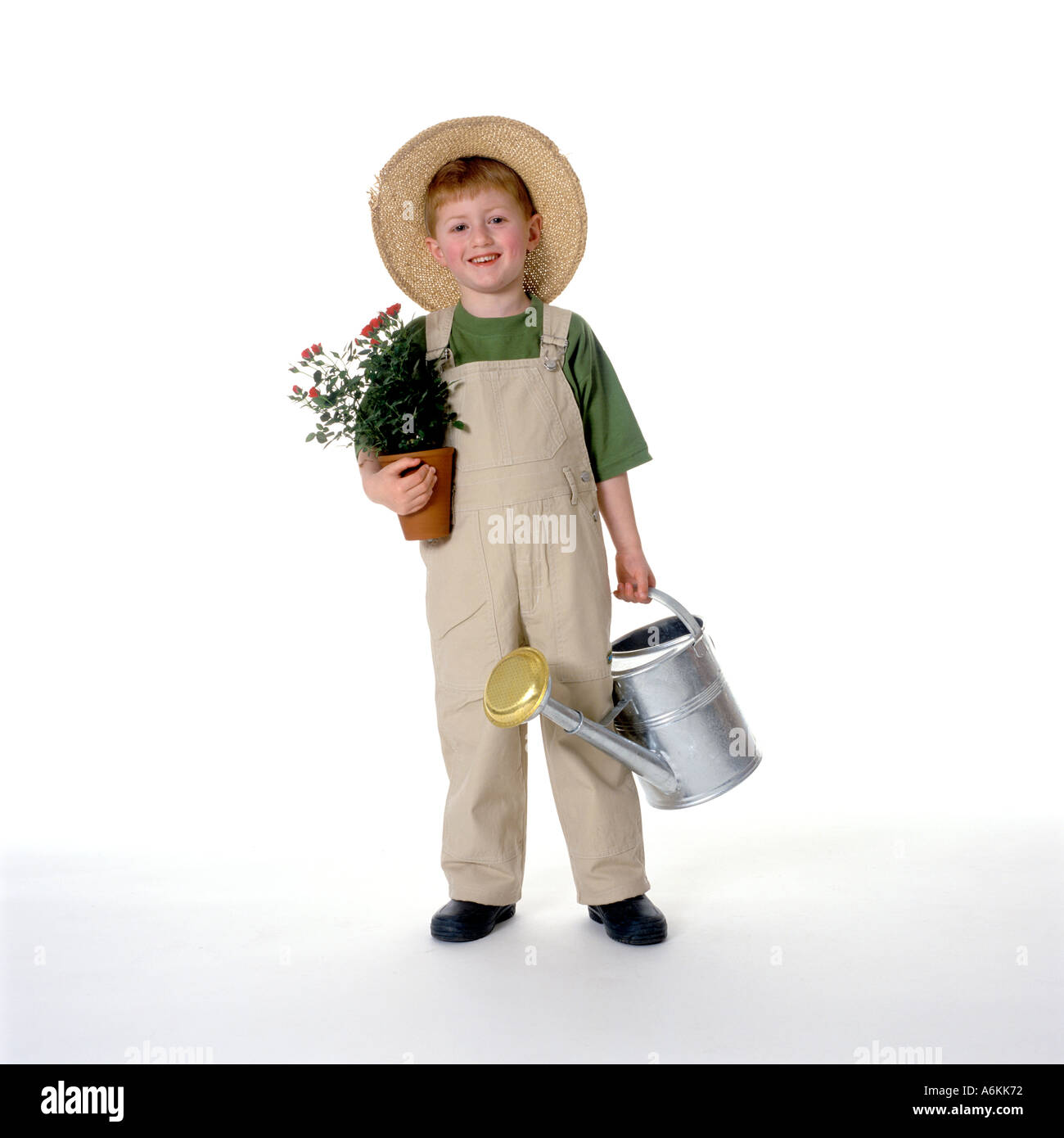 Little boy dressed as gardener Stock Photo - Alamy