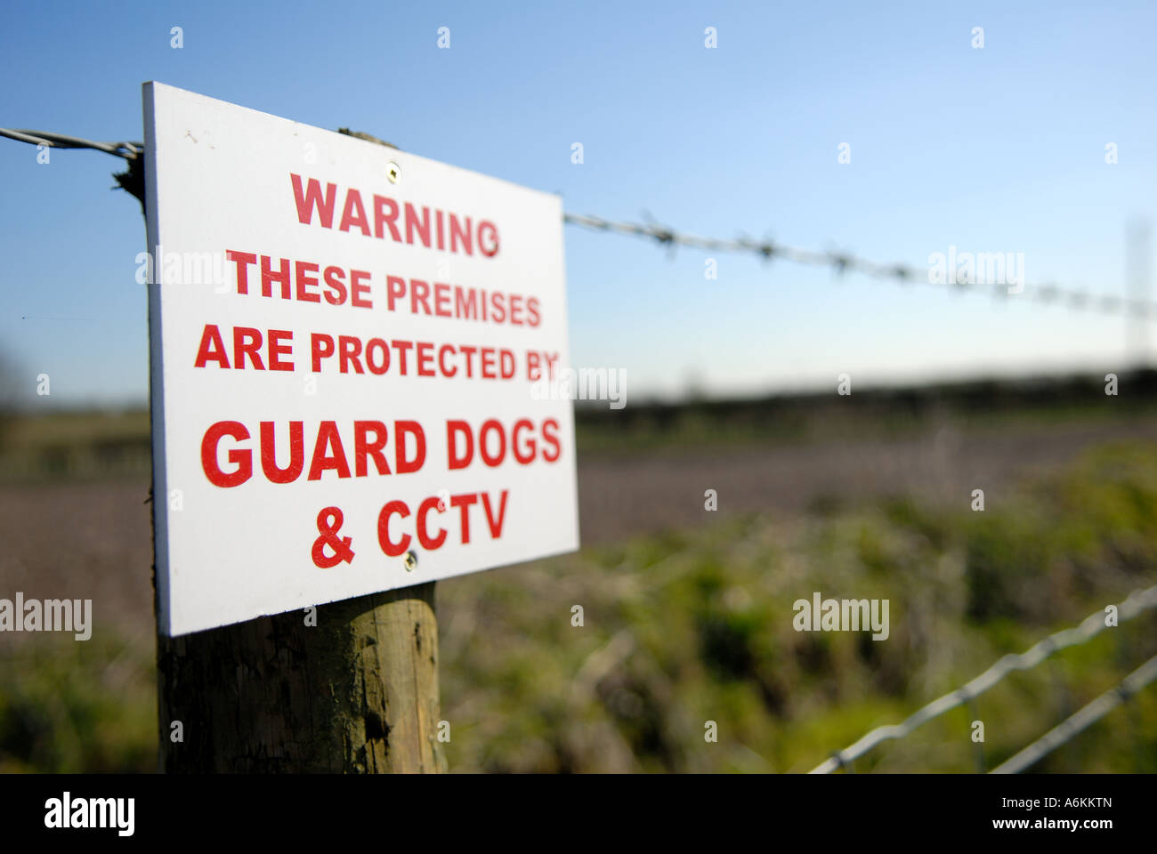 Warning premises protected by sign hi-res stock photography and images ...