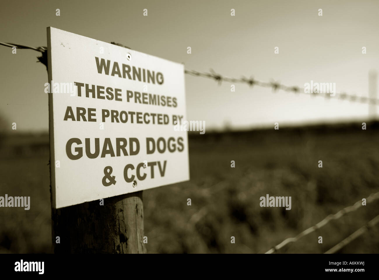 Warning premises protected by sign hi-res stock photography and images ...