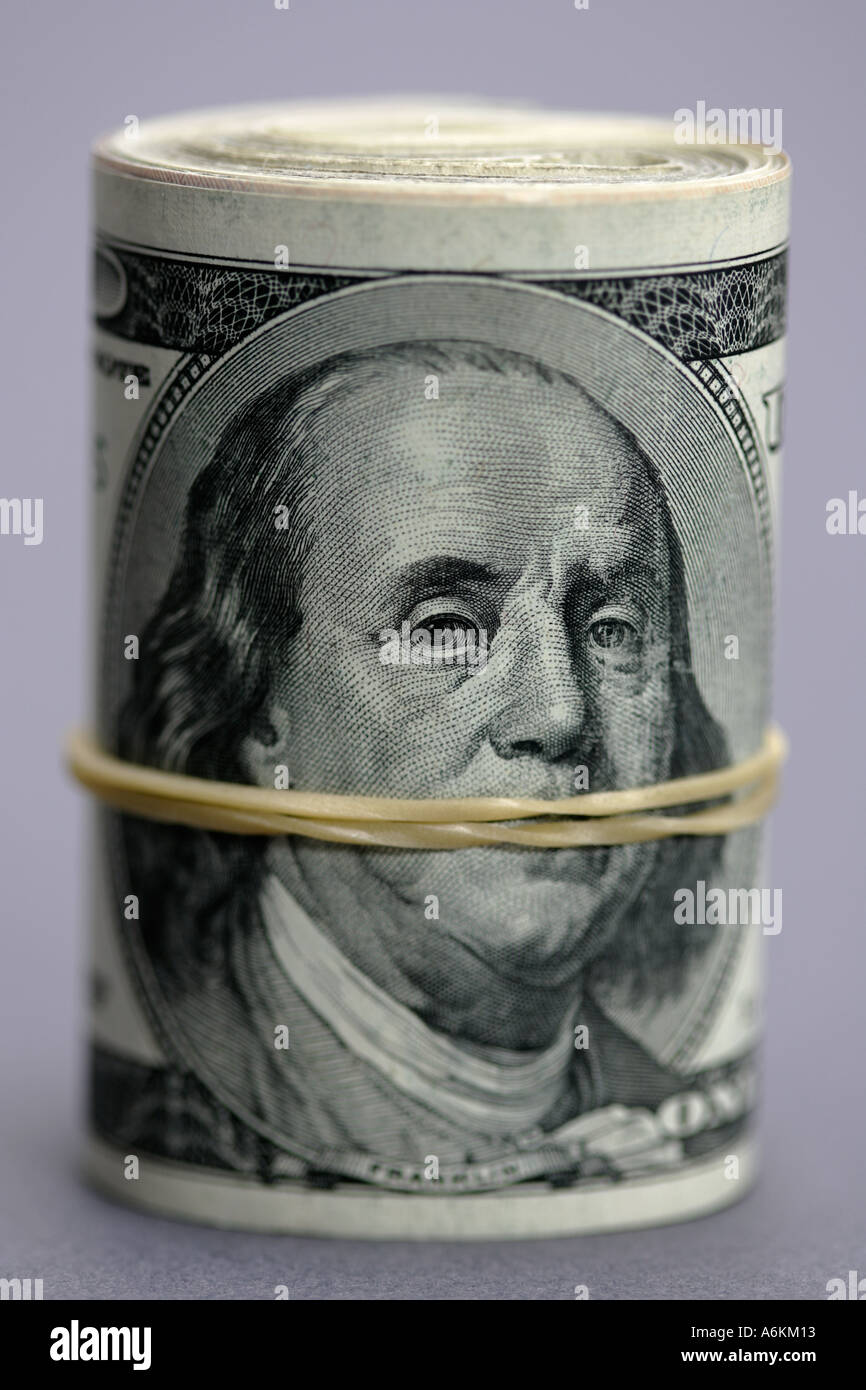 Cash roll of one hundred dollar bills hi-res stock photography and ...