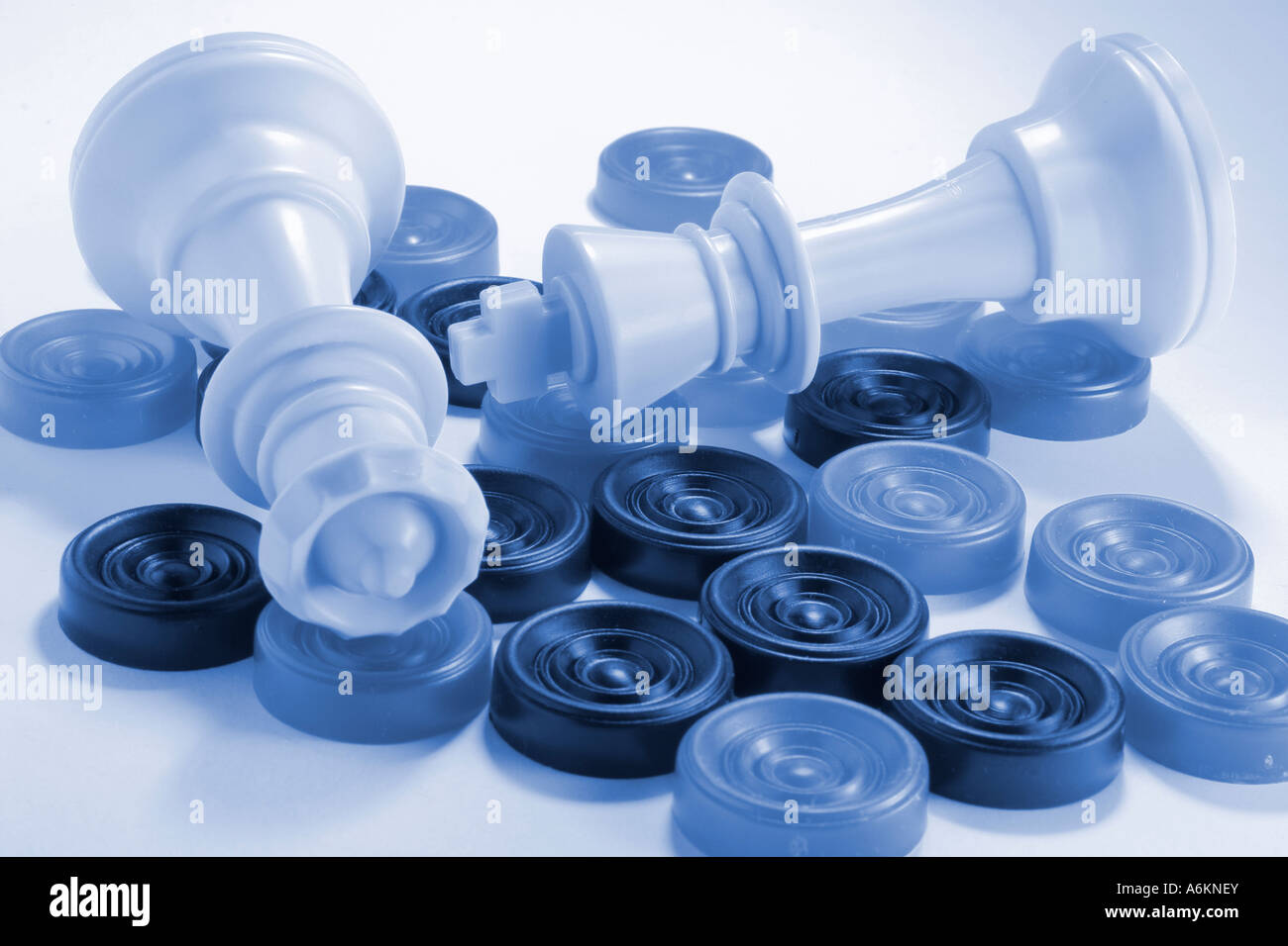 Checkers and Chess Pieces Stock Photo - Alamy
