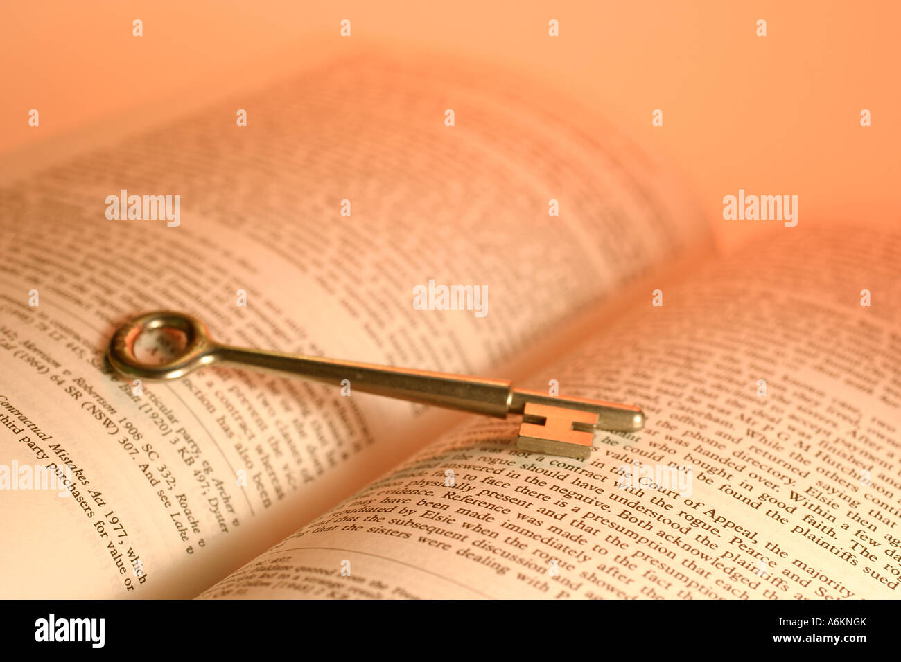 Key on Open Book Stock Photo - Alamy