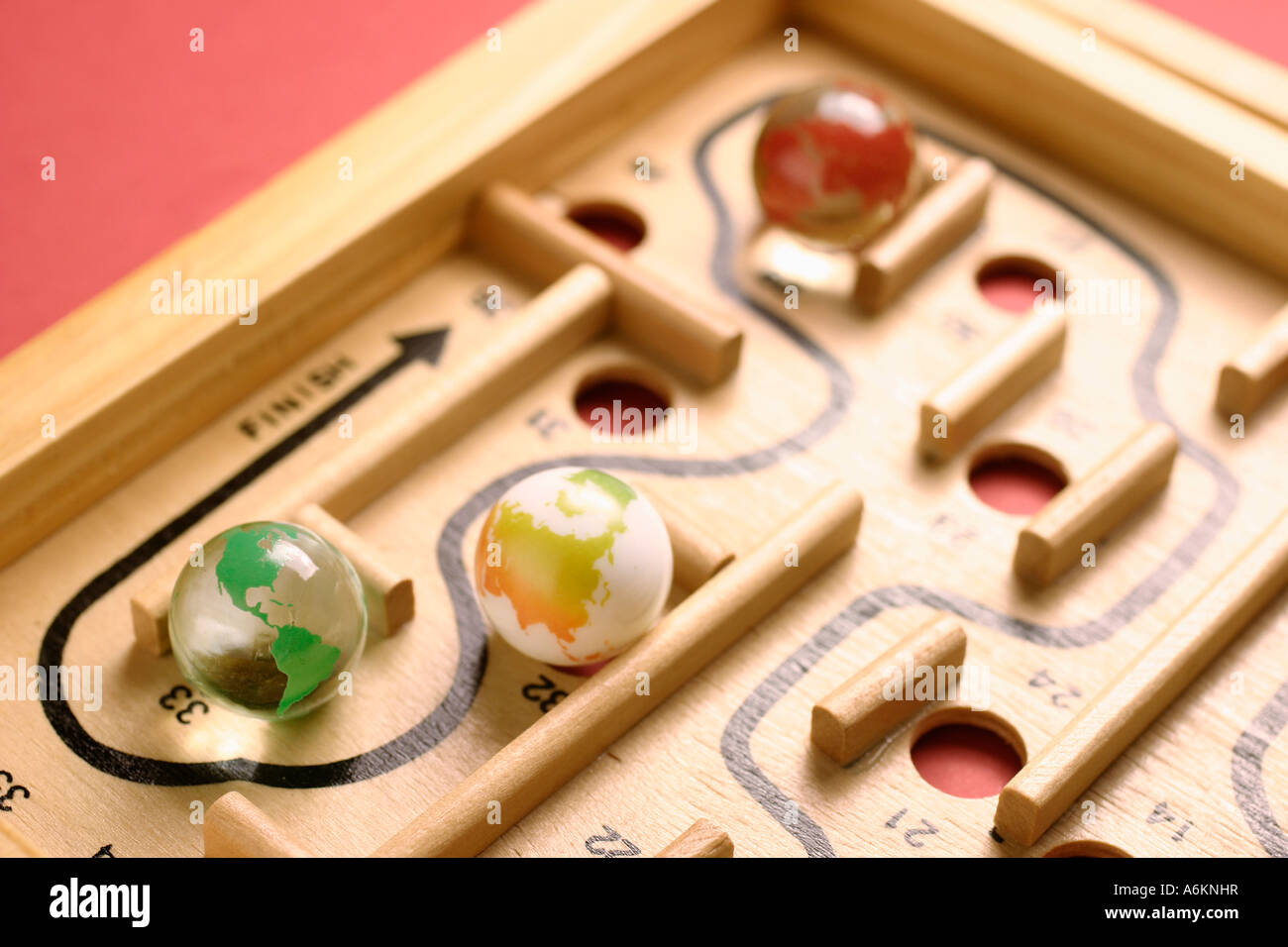 Globe Marbles on Maze Stock Photo - Alamy