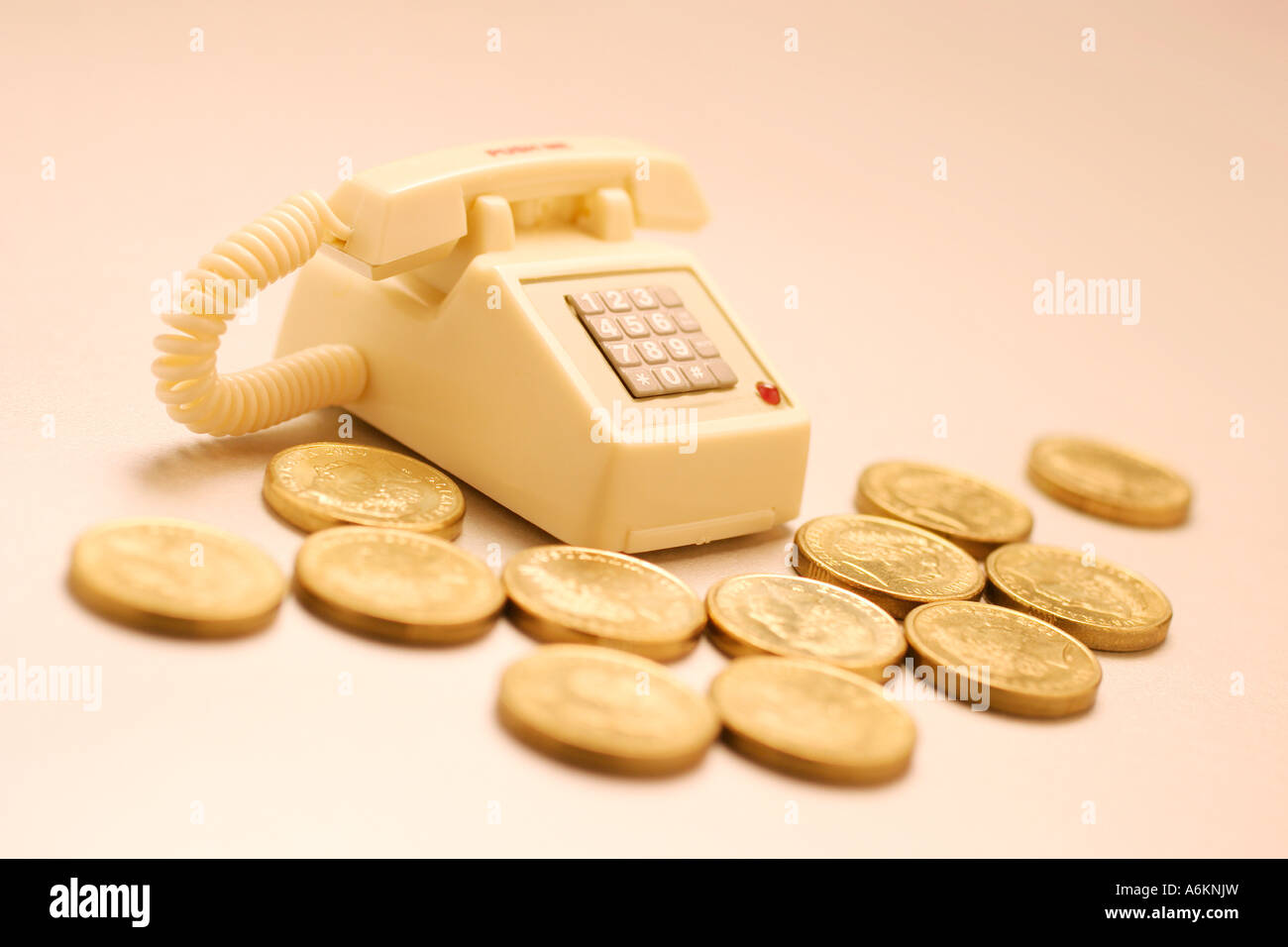Telephone and Coins Stock Photo - Alamy