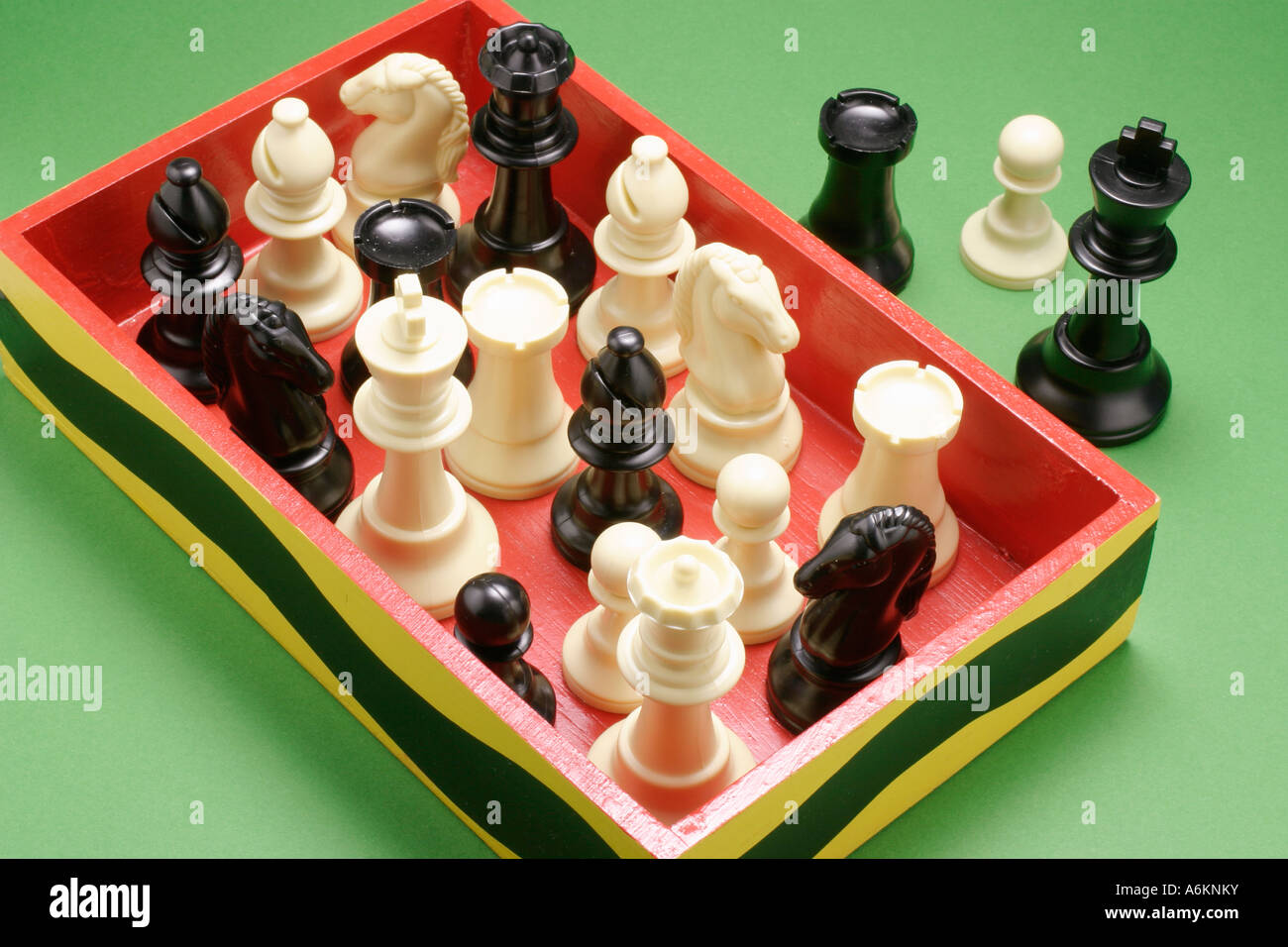 Chess Pieces in Wooden Box Stock Photo - Alamy