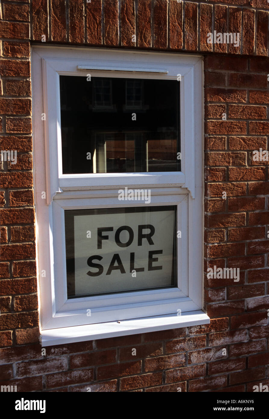 For sale sign in window Stock Photo - Alamy