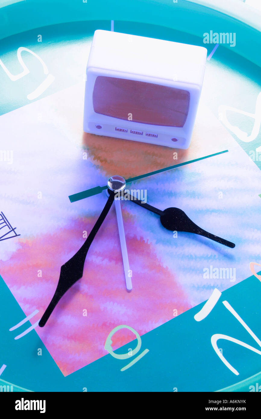 Miniature TV on Clock Stock Photo - Alamy