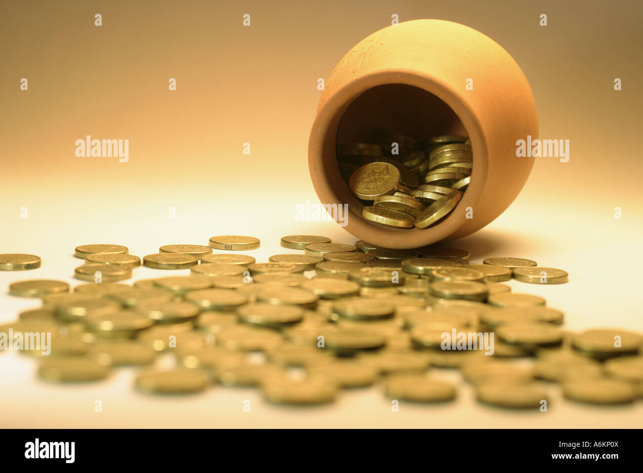 Clay Pot with Coins Stock Photo - Alamy