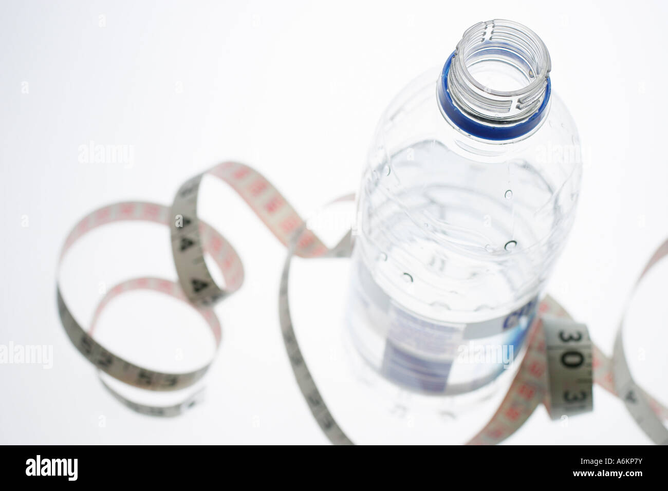 Tape Measure with Bottle of Water Stock Photo - Alamy