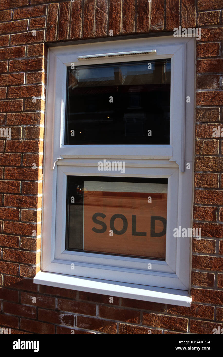 Sold Sign in Window Stock Photo - Alamy