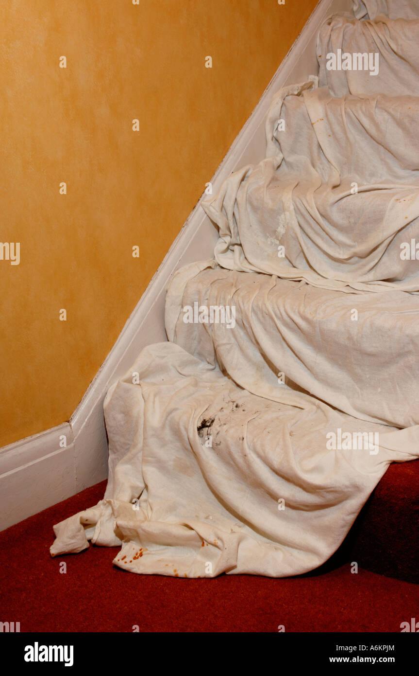 Dust sheet on stairs Stock Photo - Alamy