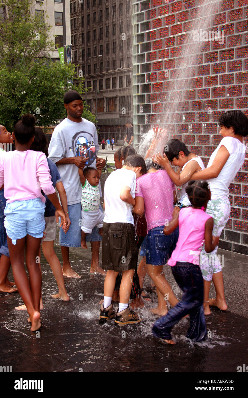Children being sprayed by Crown Fountain Millennium Park Stock Photo ...