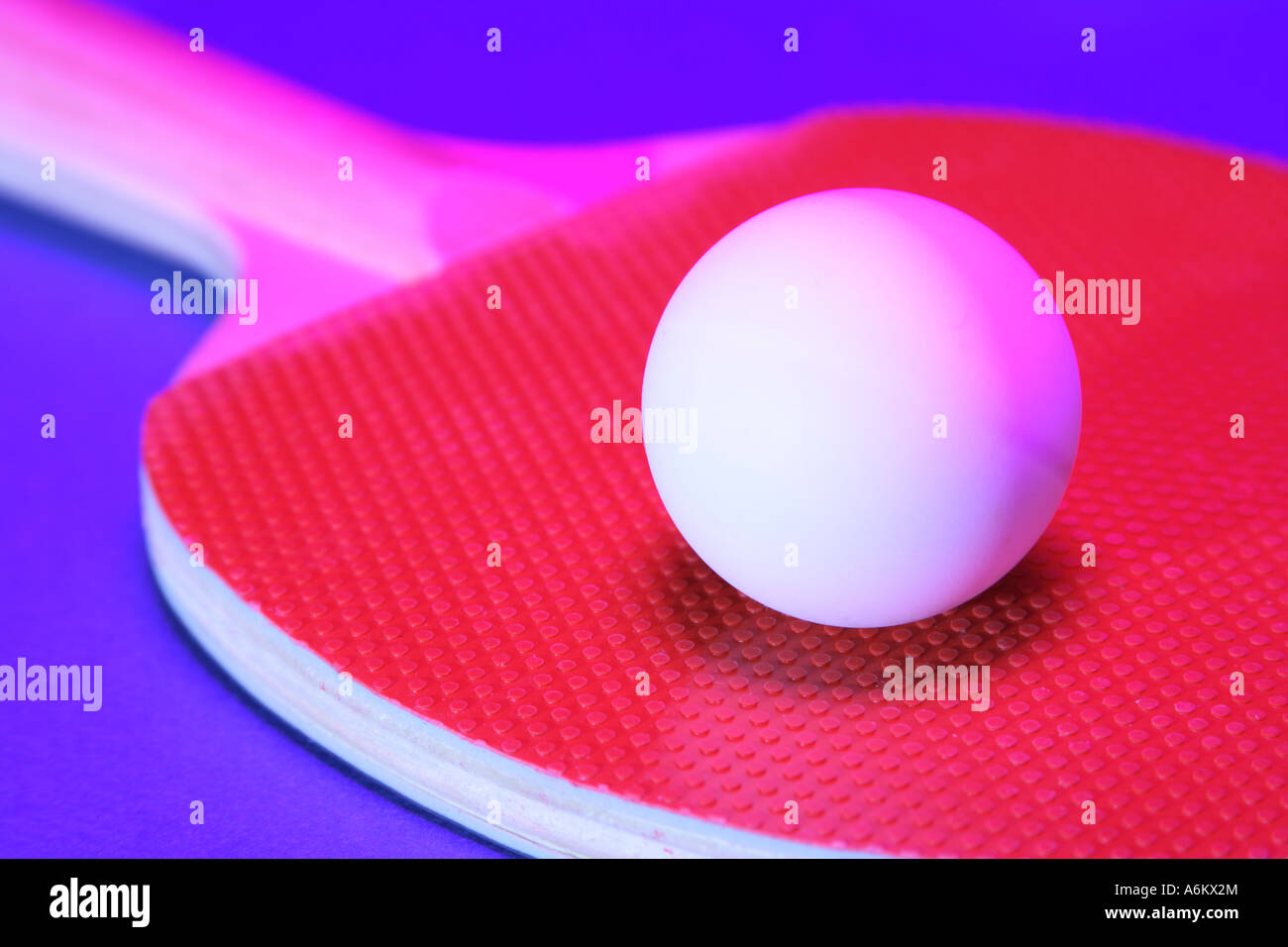 table tennis or ping pong bat with ball Stock Photo - Alamy