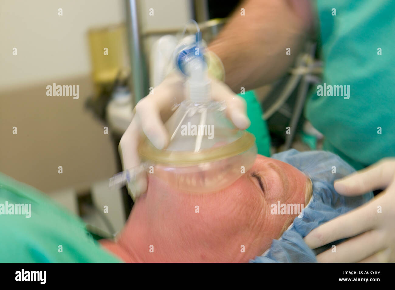 Woman receives anesthesia in operating room before surgery Stock Photo ...