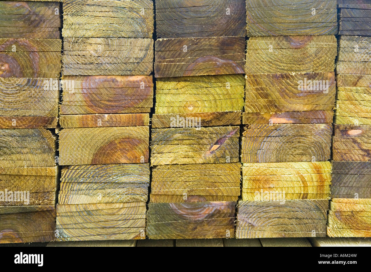 end view of stack of timber Stock Photo - Alamy