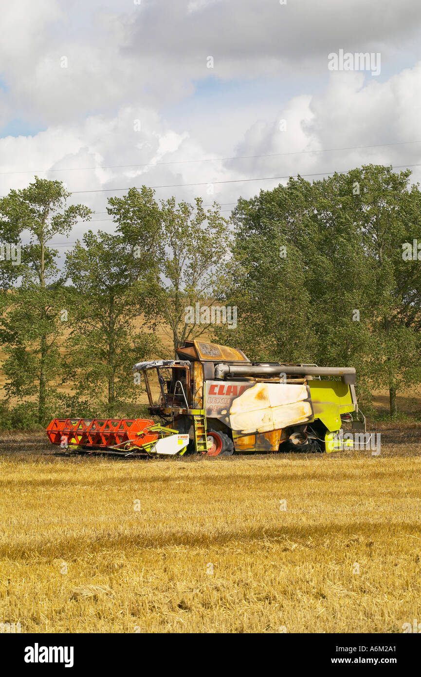 Burn burnt fire combine harvester Stock Photo - Alamy