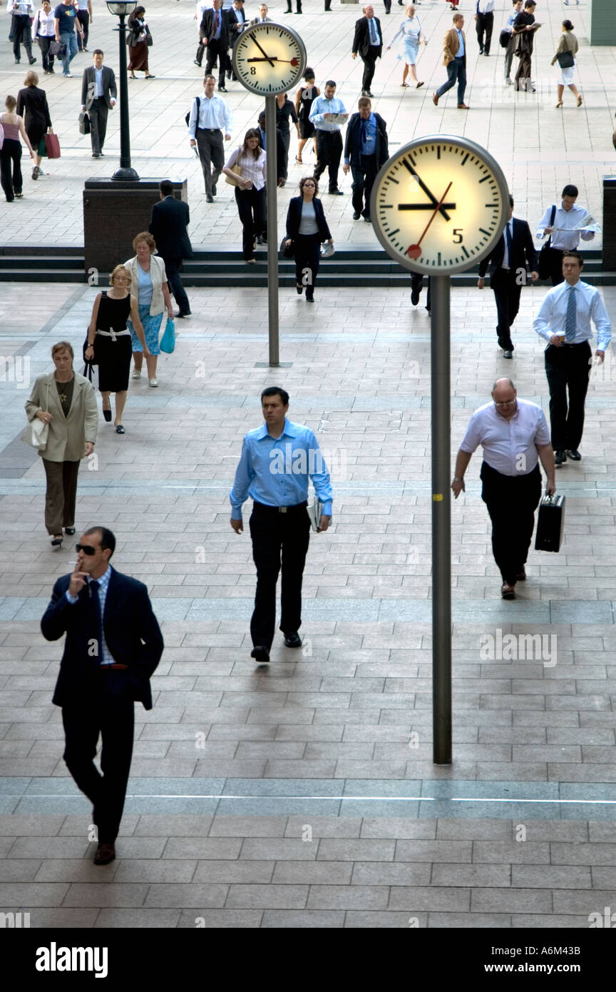 Eary morning rush hour Canary Wharf London UK Stock Photo - Alamy
