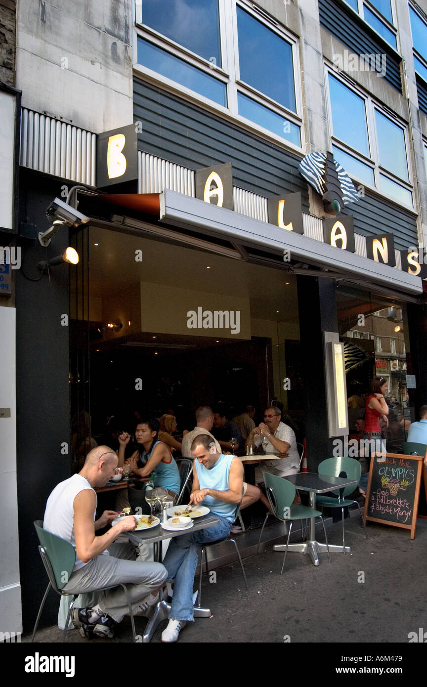 People eating outside the Balans restaurant in Old Compton St Soho ...