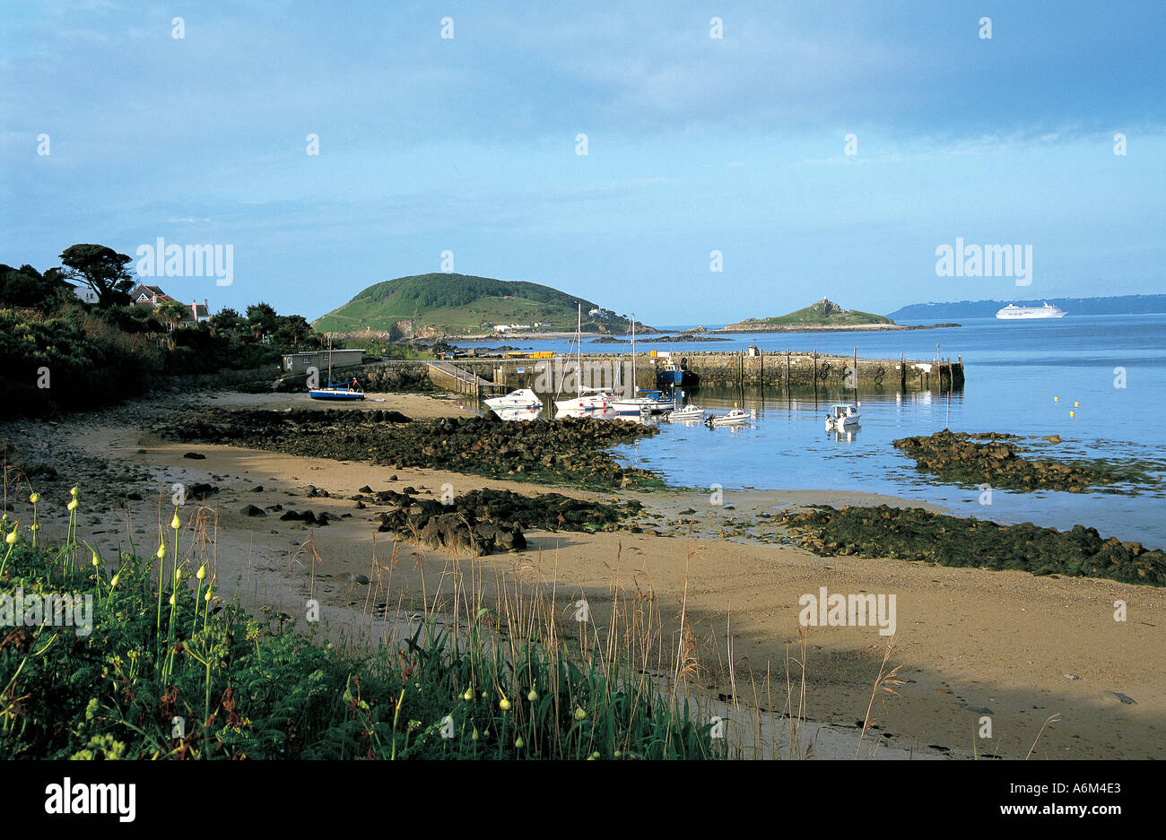 Jethou and harbour at Fishermans Beach Stock Photo - Alamy