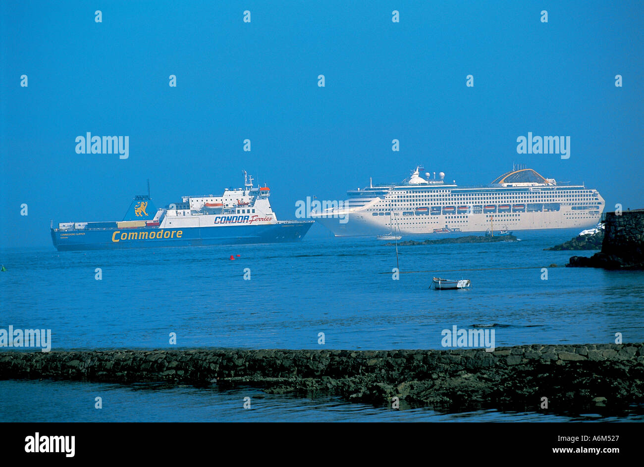 A cargo vessel cruise liner pass in the water known as The Little ...