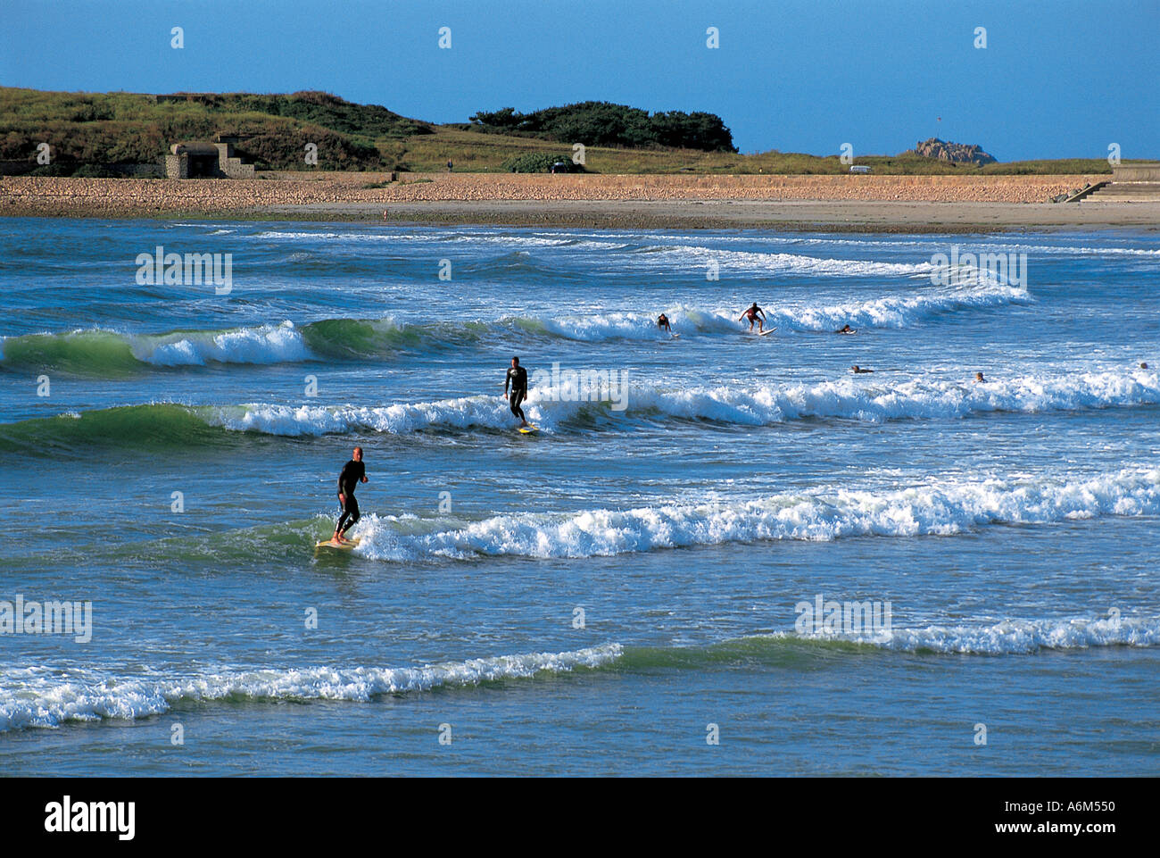 People surfing at Vazon Bay Stock Photo - Alamy